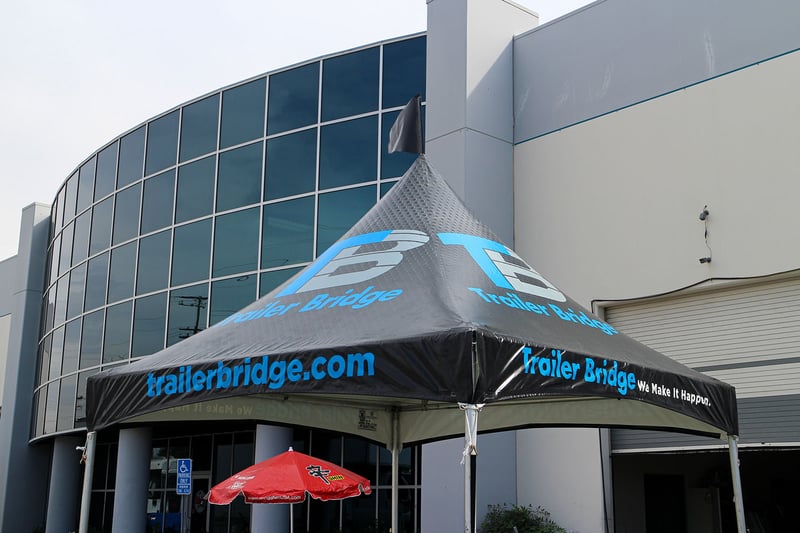 Trailer Bridge Logistics | Custom Tent